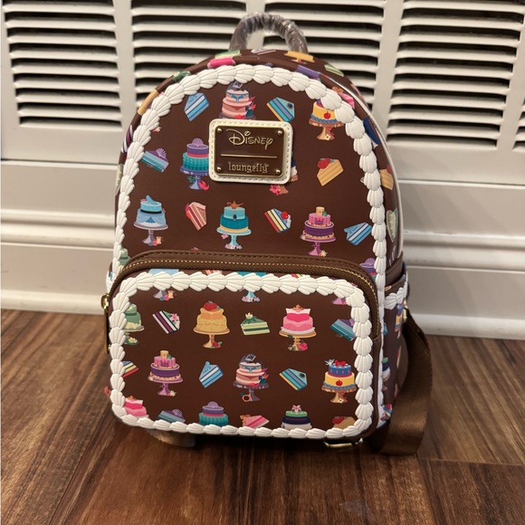 Loungefly | Accessories | Loungefly Disney Princess Cake Backpack ...